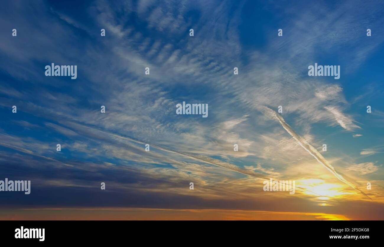 Beautiful early morning sunset above clouds with dramatic light with ...