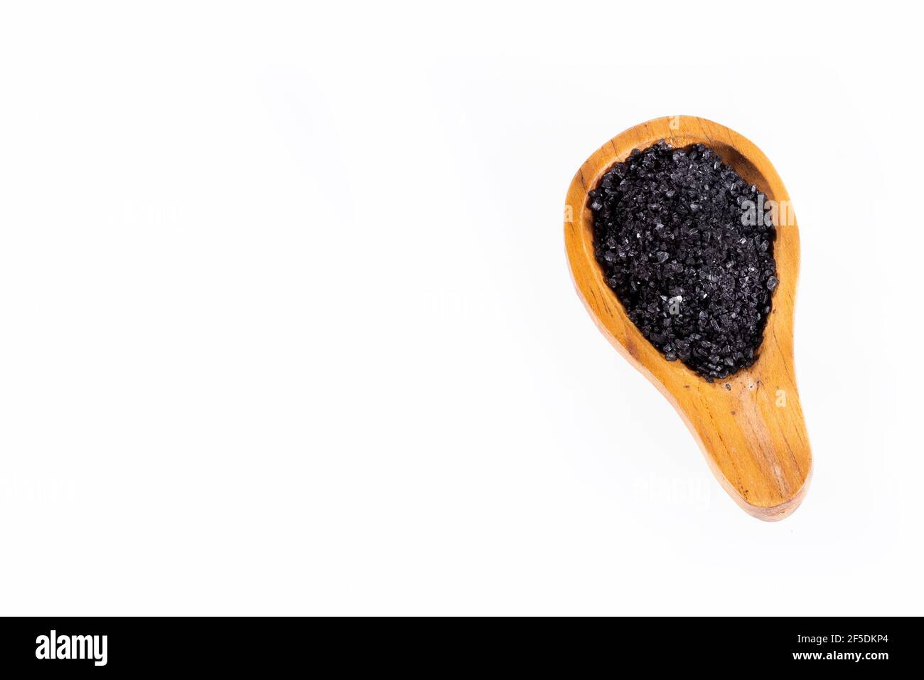 Natural black salt of Hawaii on white background Stock Photo - Alamy