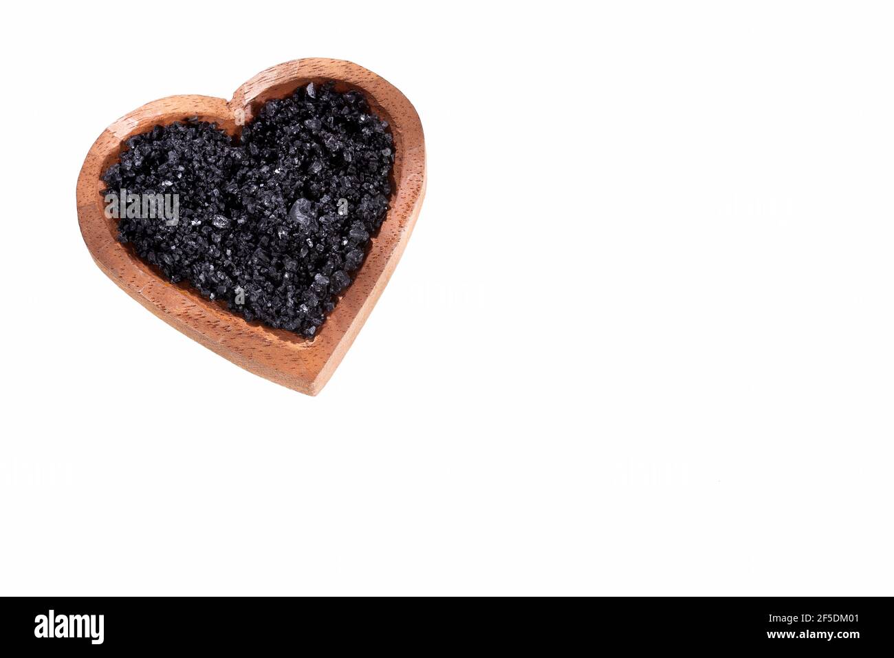 Natural black salt of Hawaii on white background Stock Photo - Alamy