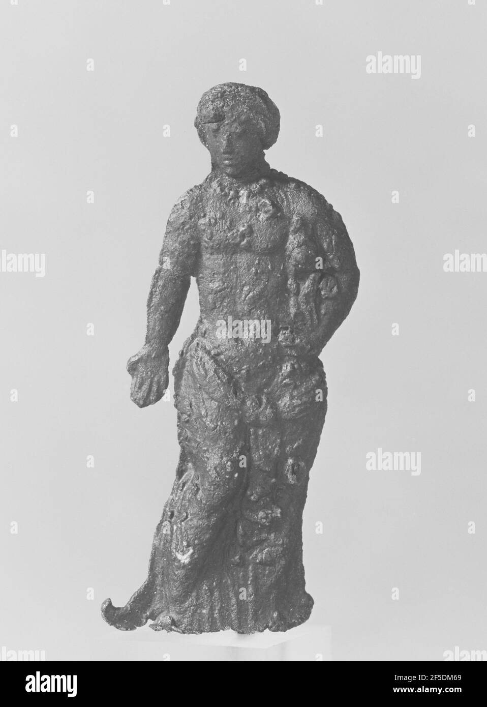 Statuette of a Male Figure. Unknown Stock Photo - Alamy