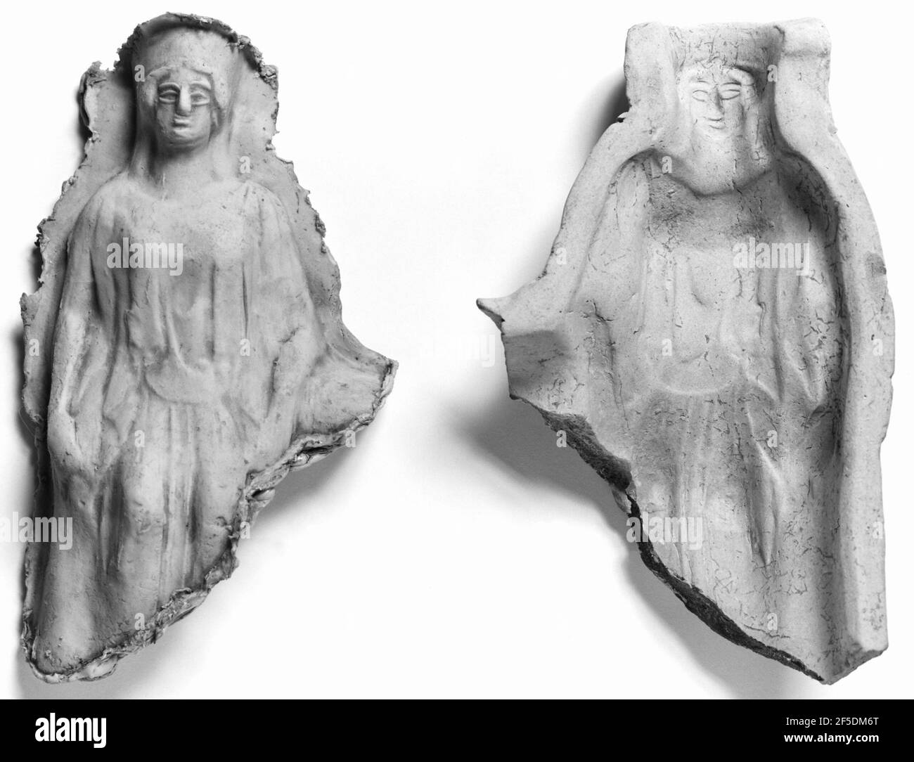 Mold of a Seated Frontal Female Figure. Unknown Stock Photo - Alamy