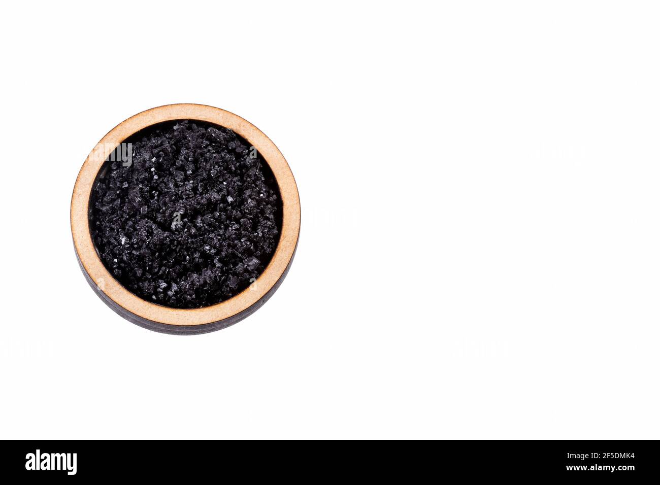 Natural black salt of Hawaii on white background Stock Photo - Alamy