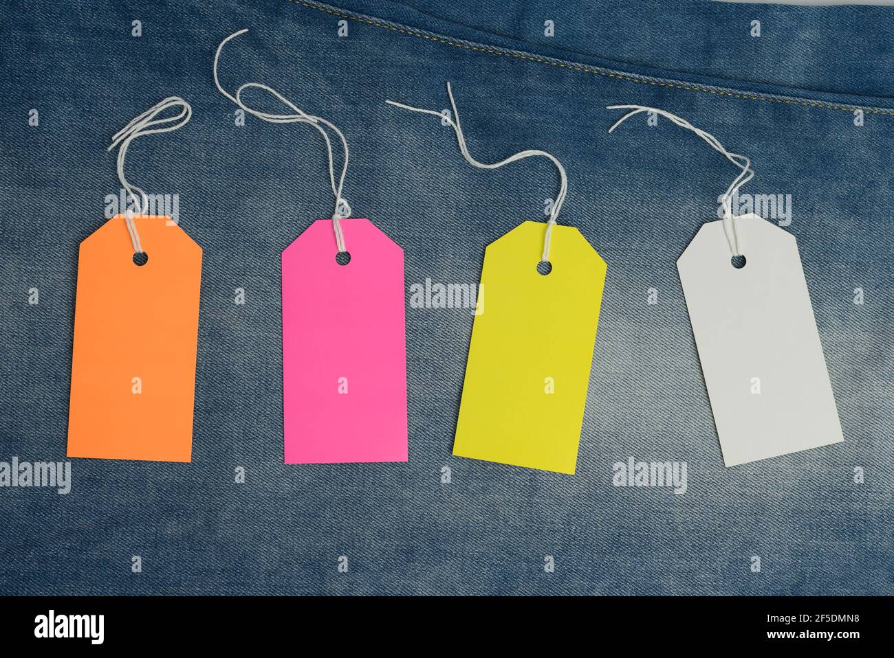 Denim jeans tags hi-res stock photography and images - Alamy