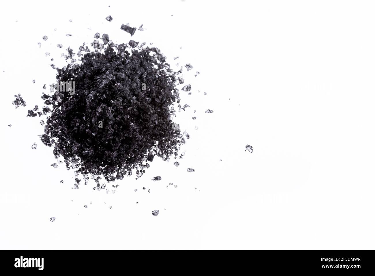 Natural black salt of Hawaii on white background Stock Photo - Alamy