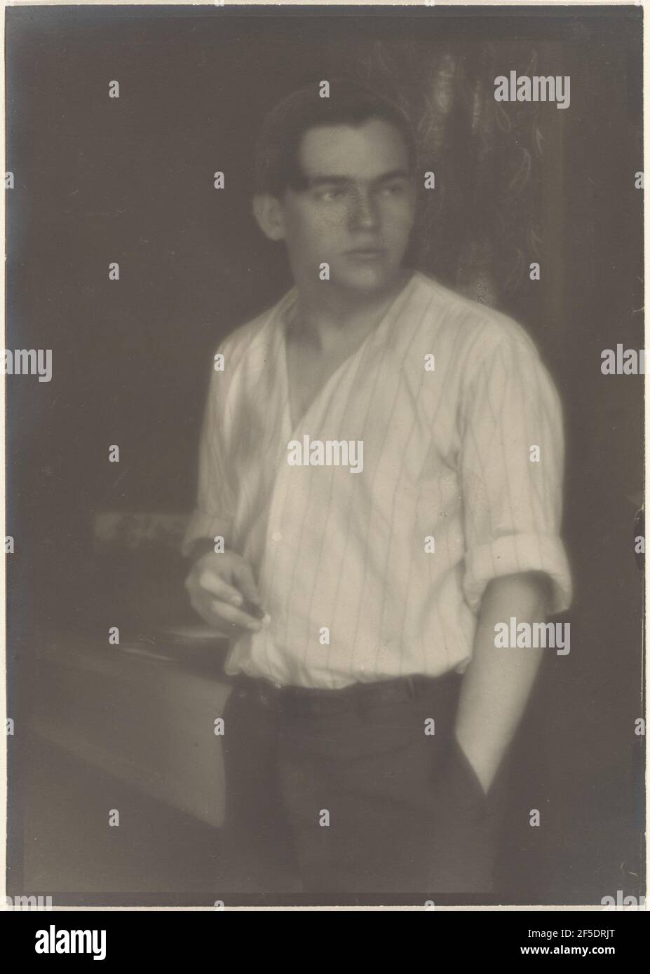 Portrait of a Young Man in Striped Shirt with Cigarette. Louis ...
