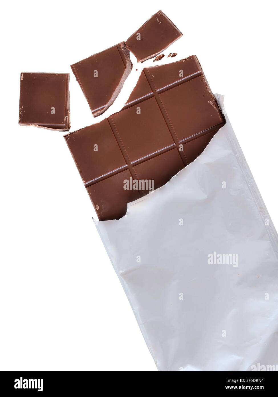 Block of chocolate with broken cubes in silver foil packaging top view ...
