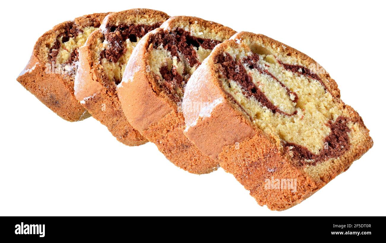 Sliced marble cake closeup isolated on white background Stock Photo - Alamy