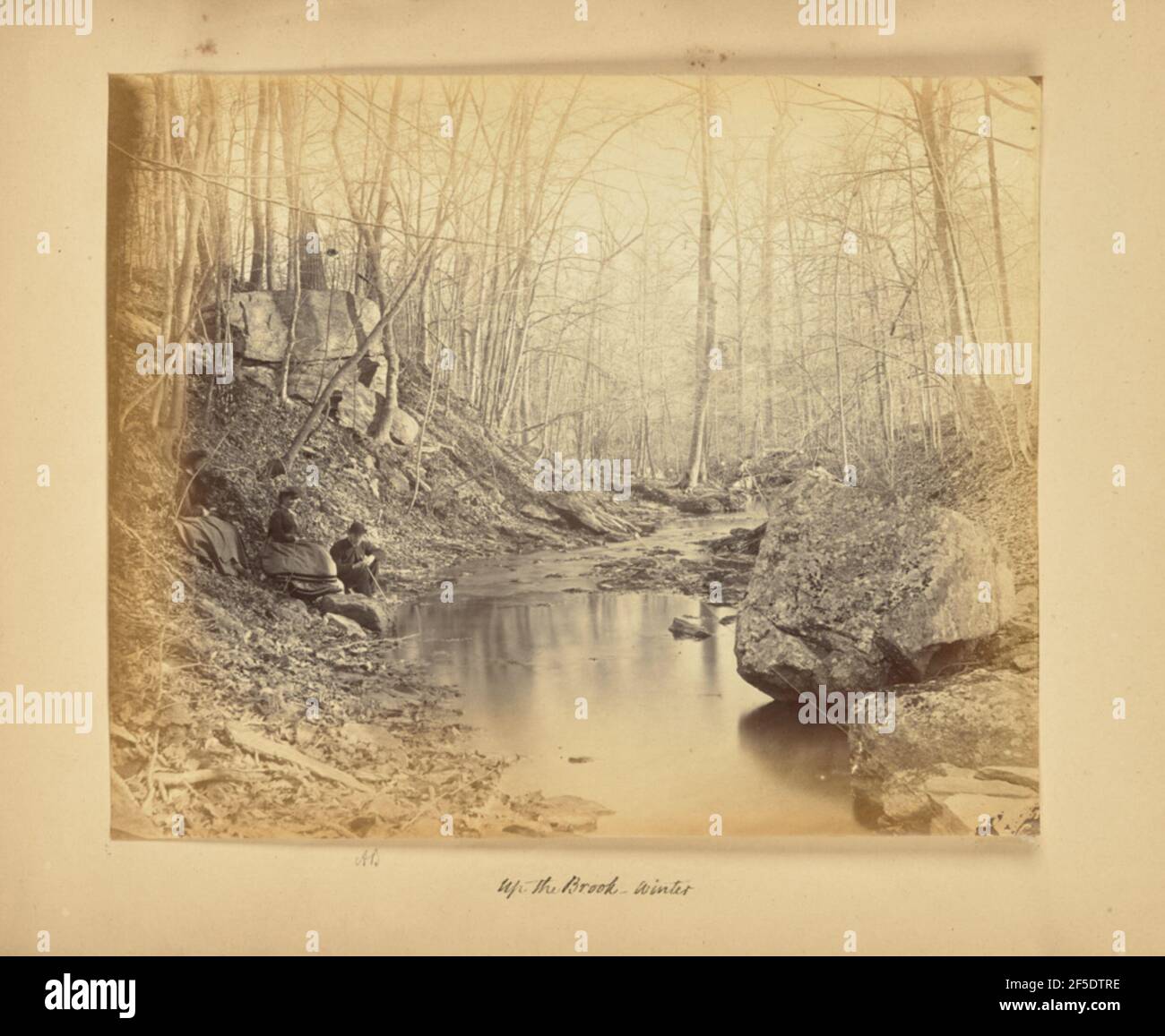 Up the Brook - Winter. View of a brook running through a forest. Bare ...