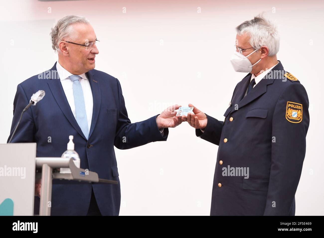 26 March 2021, Bavaria, Roding: Bavarian Minister of the Interior Joachim Herrmann (l, CSU ...