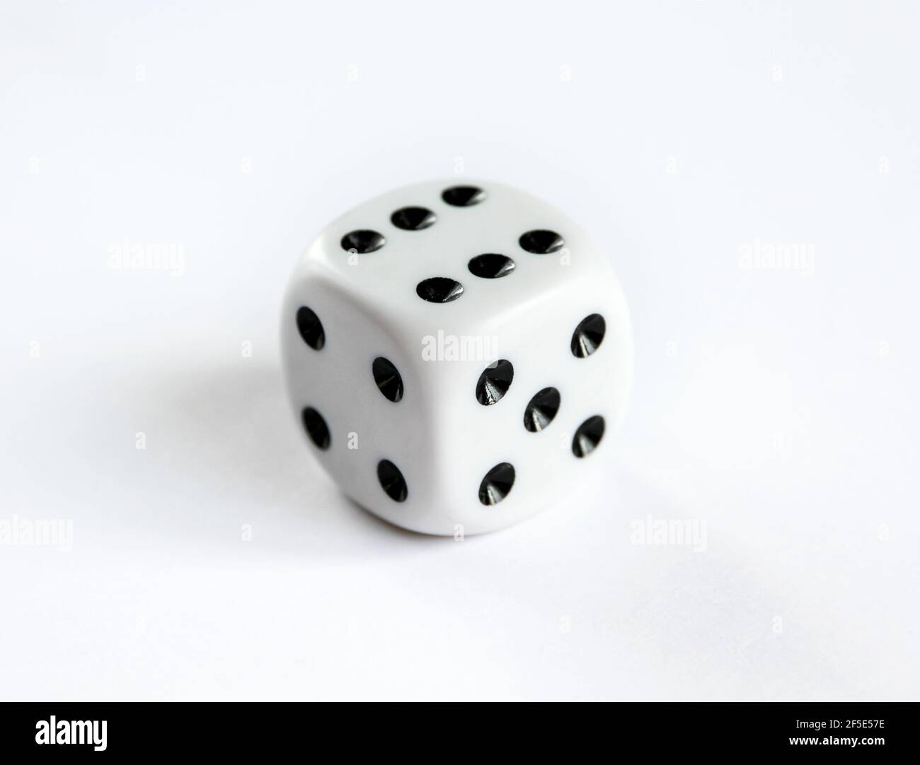 Clean dice isolated on white background. Top view Stock Photo - Alamy