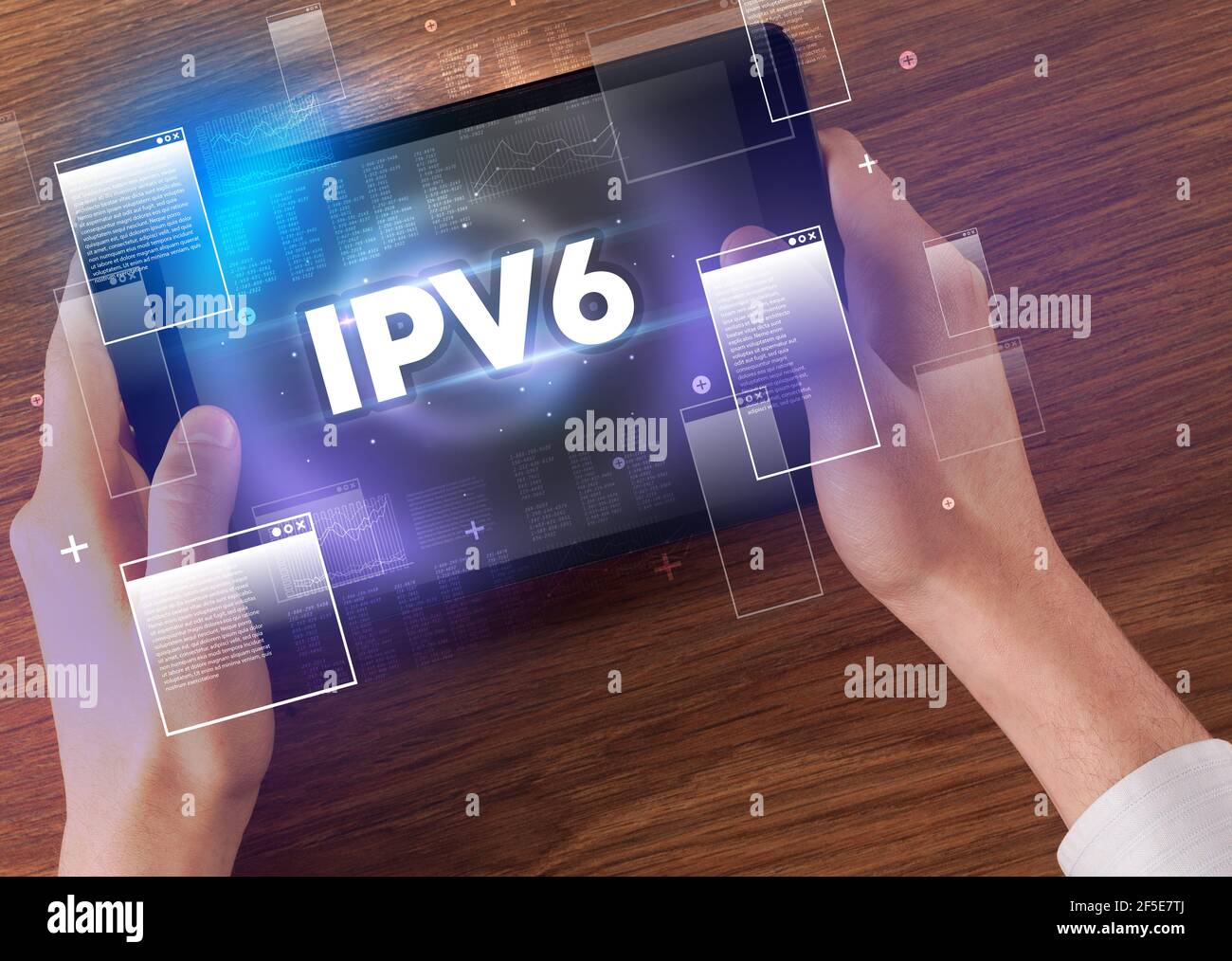 Close-up of a hand holding tablet Stock Photo - Alamy