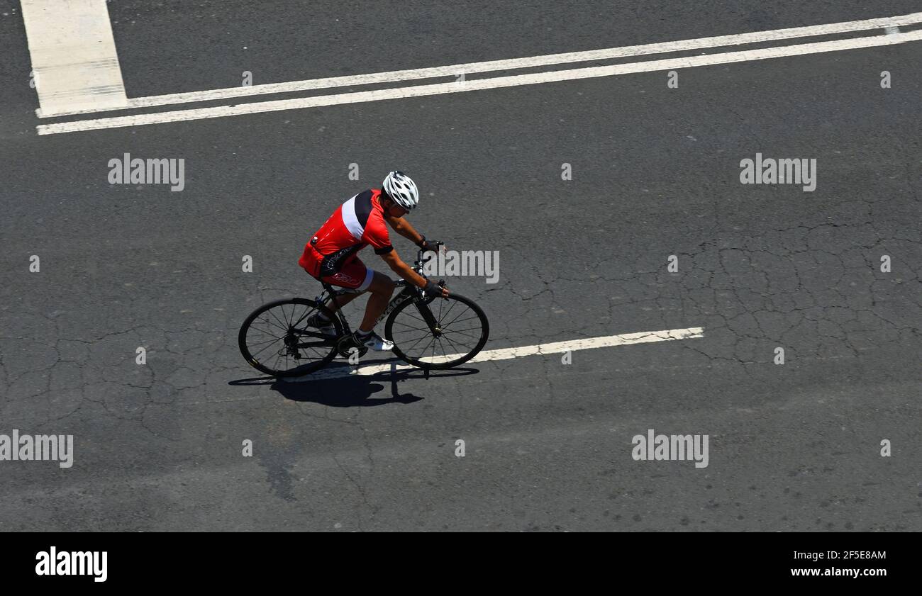 Road cyclist in red taken from above Stock Photo - Alamy