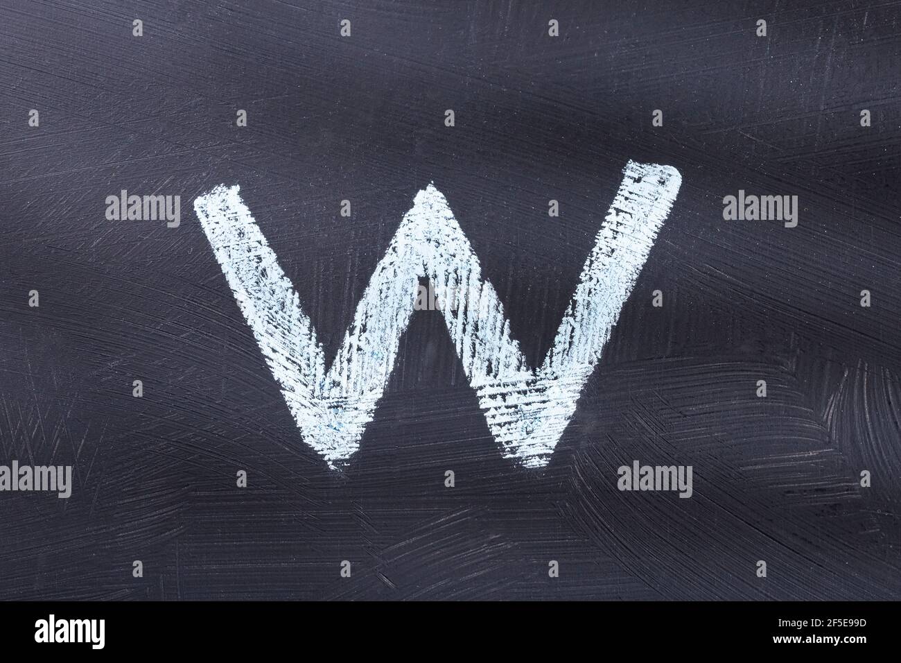 Letter W of the alphabet written with chalk Stock Photo - Alamy