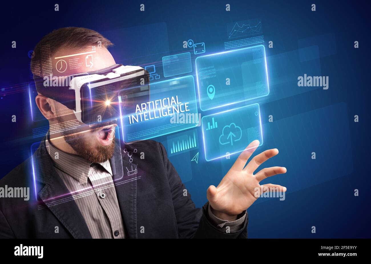 Businessman looking through Virtual Reality glasses, tech concept Stock ...