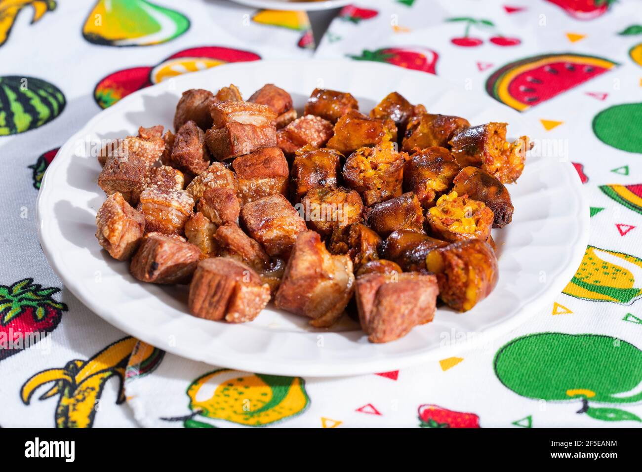 Chopped traditional Colombian dish - chorizo and chicharrón Stock Photo ...