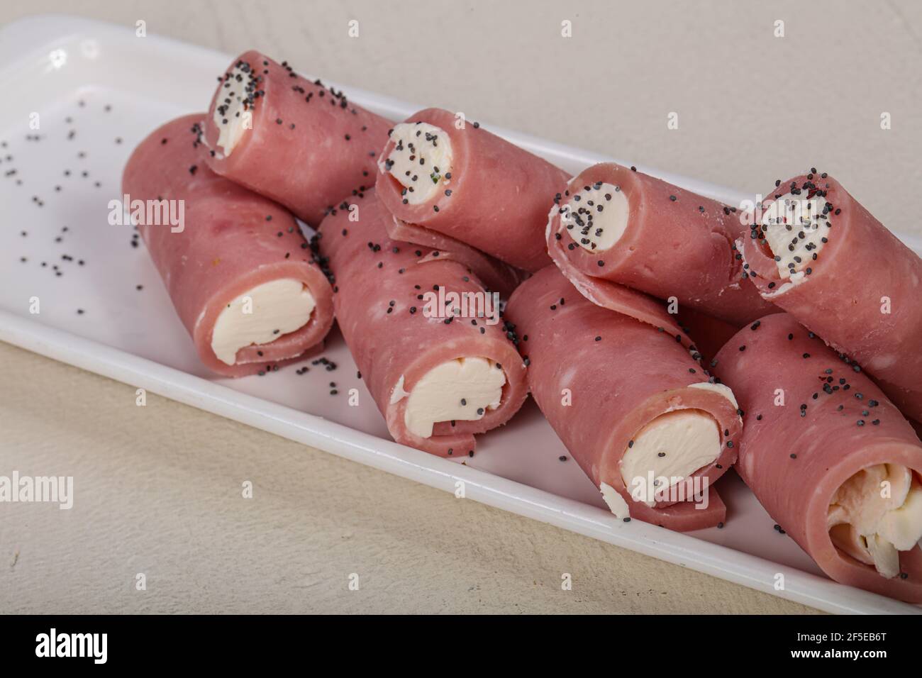 Stuffed Roll with ham and cheese Stock Photo - Alamy