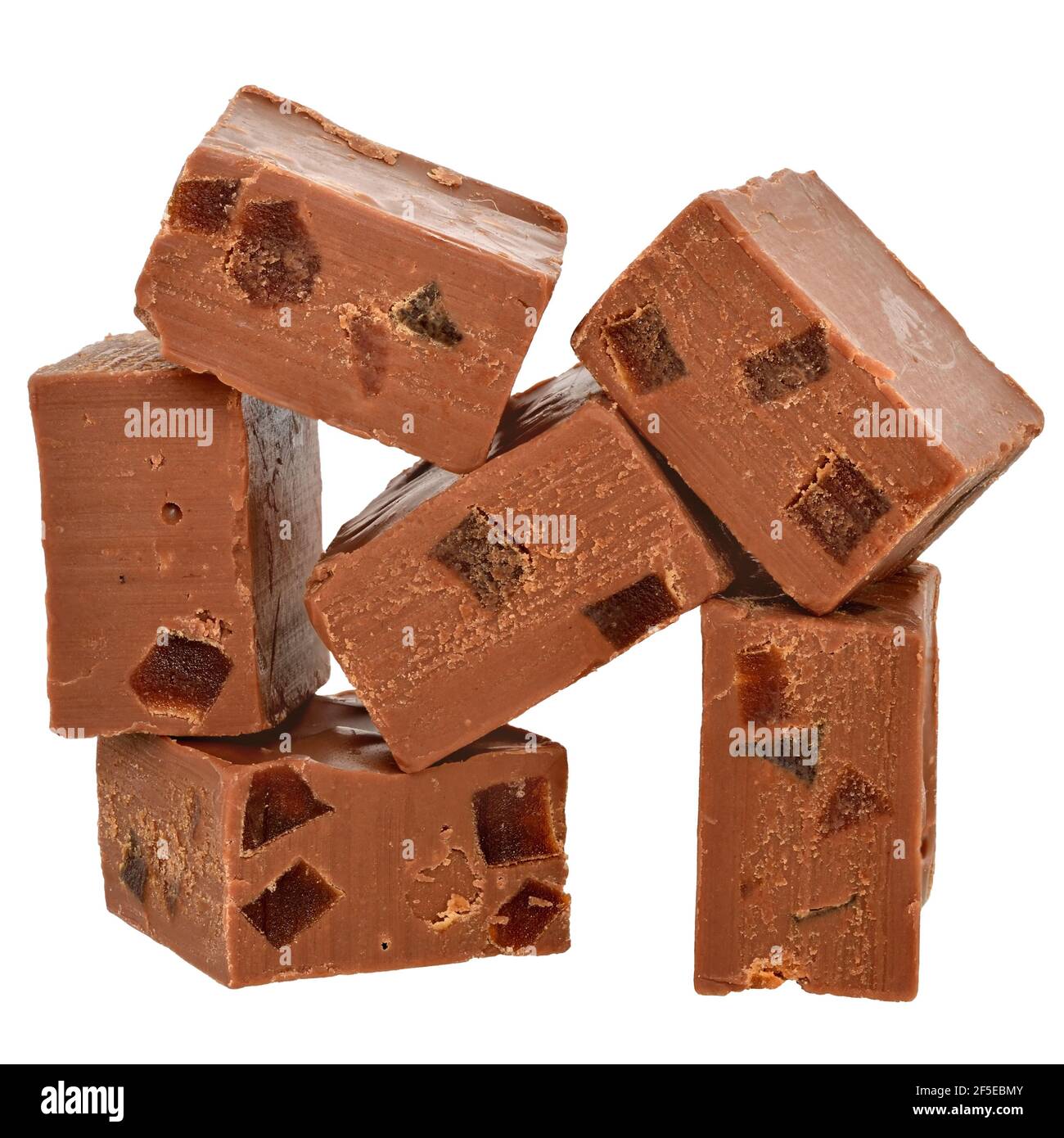 Milk chocolate cubes filled with orange candied fruit isolated on white ...