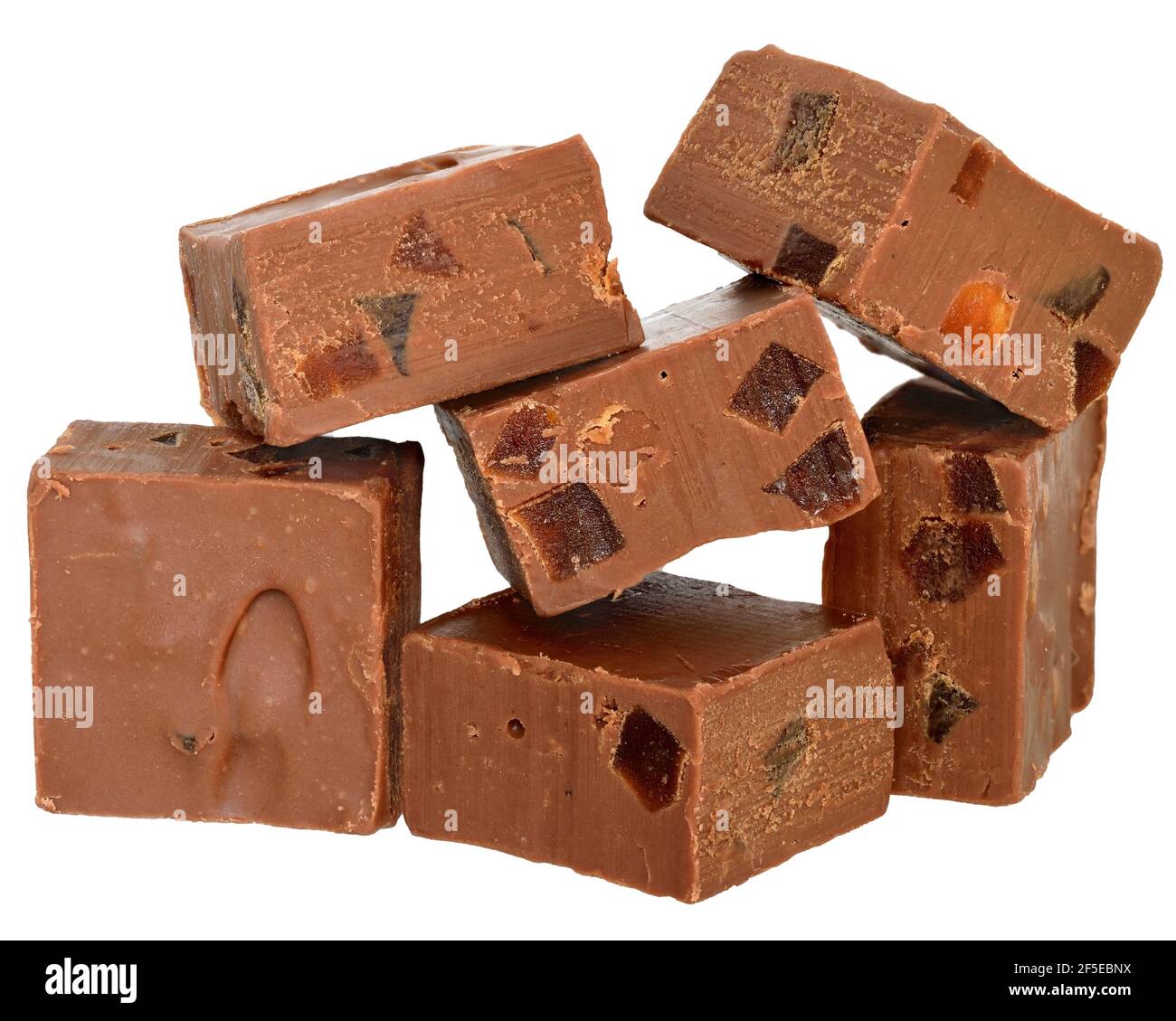 Milk chocolate cubes filled with orange candied fruit isolated on white ...