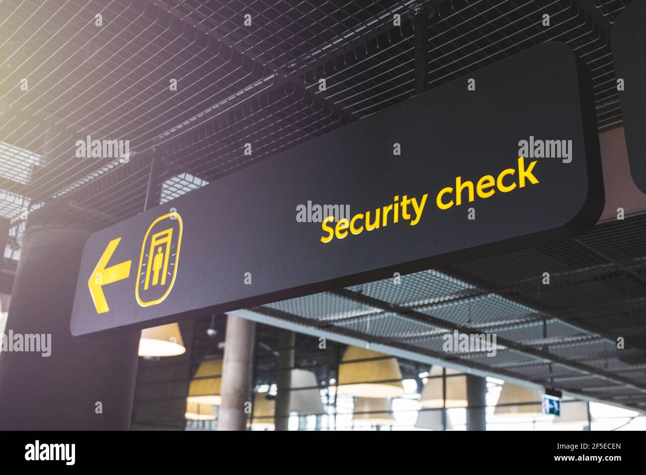 Airport informaction signs. Arrow on information screen leading to ...