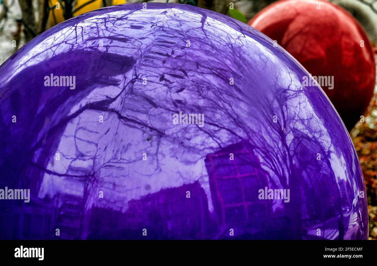 Giant glossy plastic balls in an outdoor setting Stock Photo - Alamy