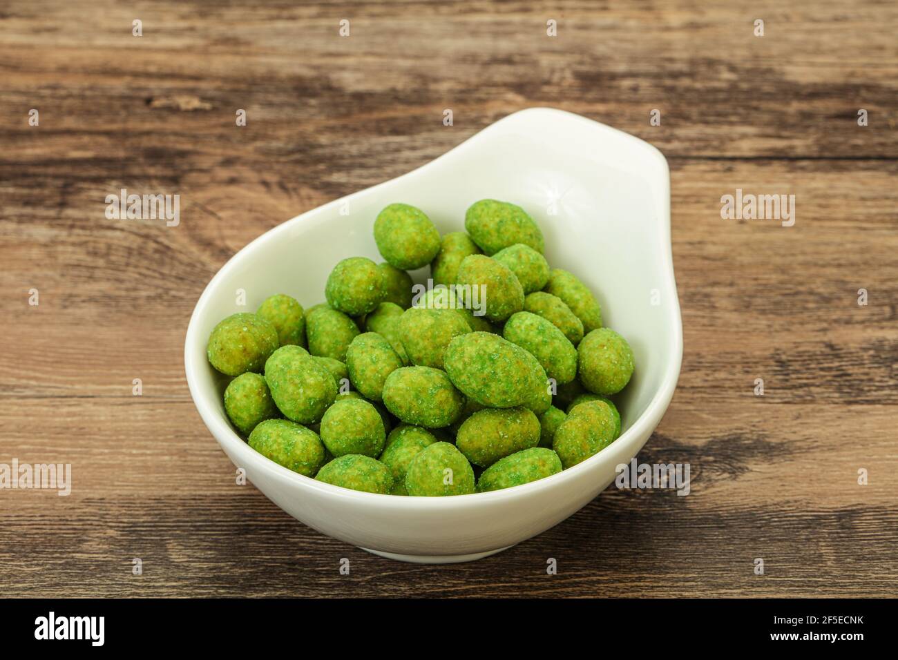 Spicy wasabi peanuts snack in the bowl Stock Photo - Alamy