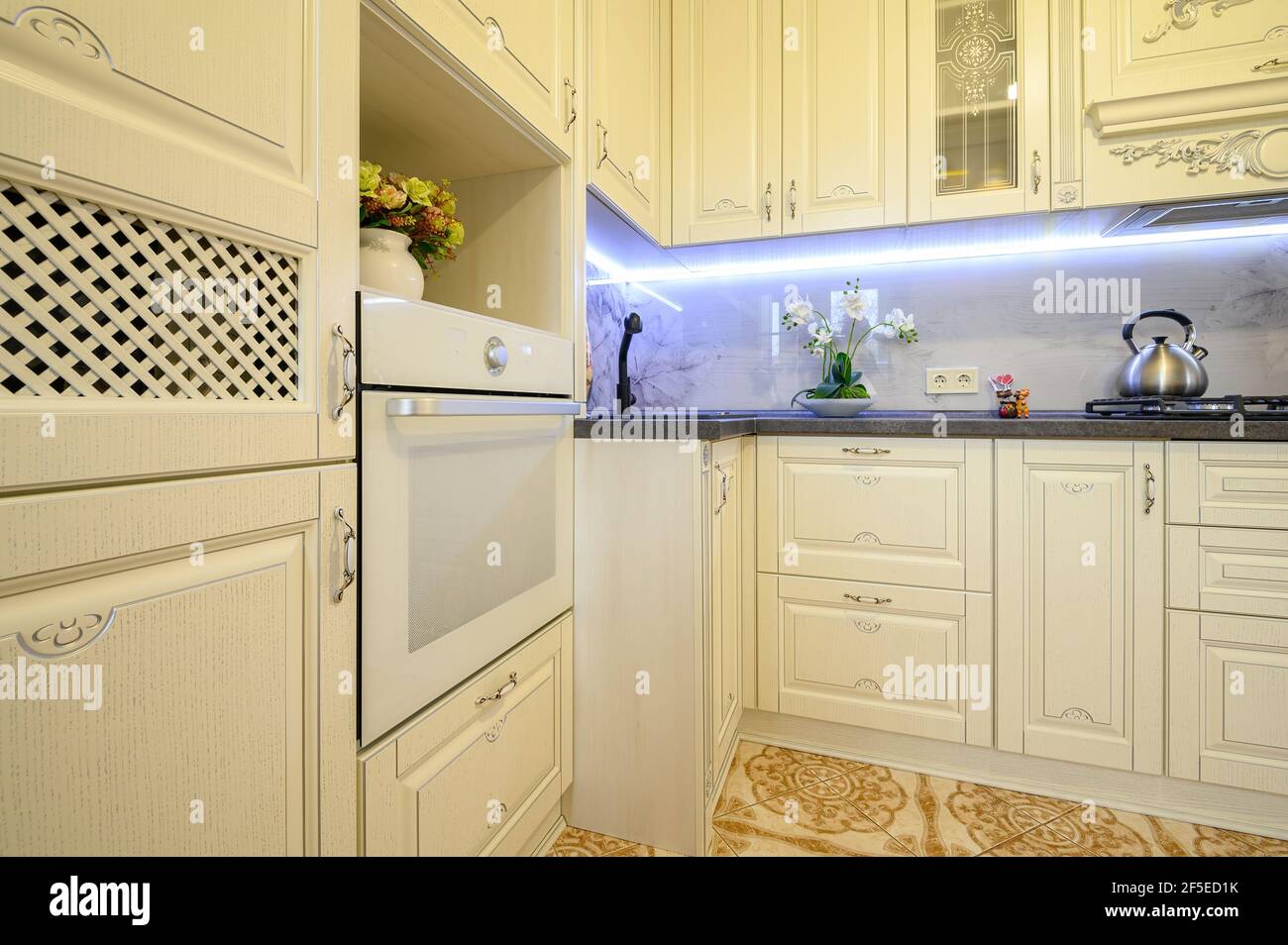 Luxury cream colored classic kitchen interior Stock Photo - Alamy