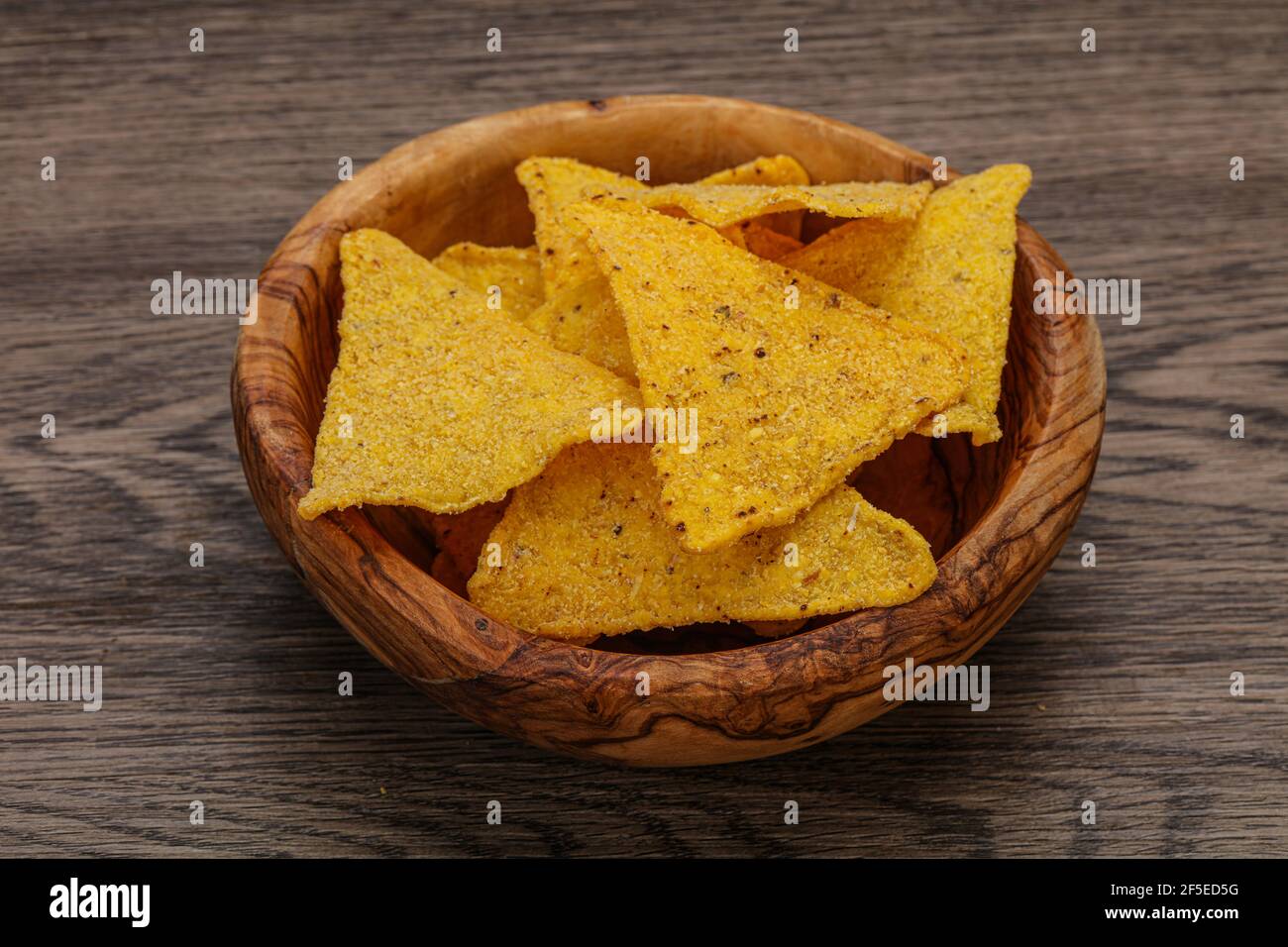 Mexican crunchy corn nachos triangle heap Stock Photo - Alamy