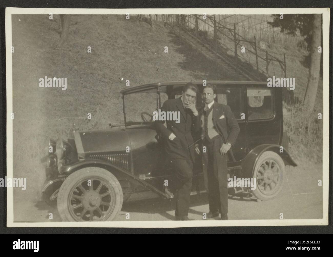 Two men and car. Fédèle Azari (Italian, 1895 - 1930 Stock Photo - Alamy