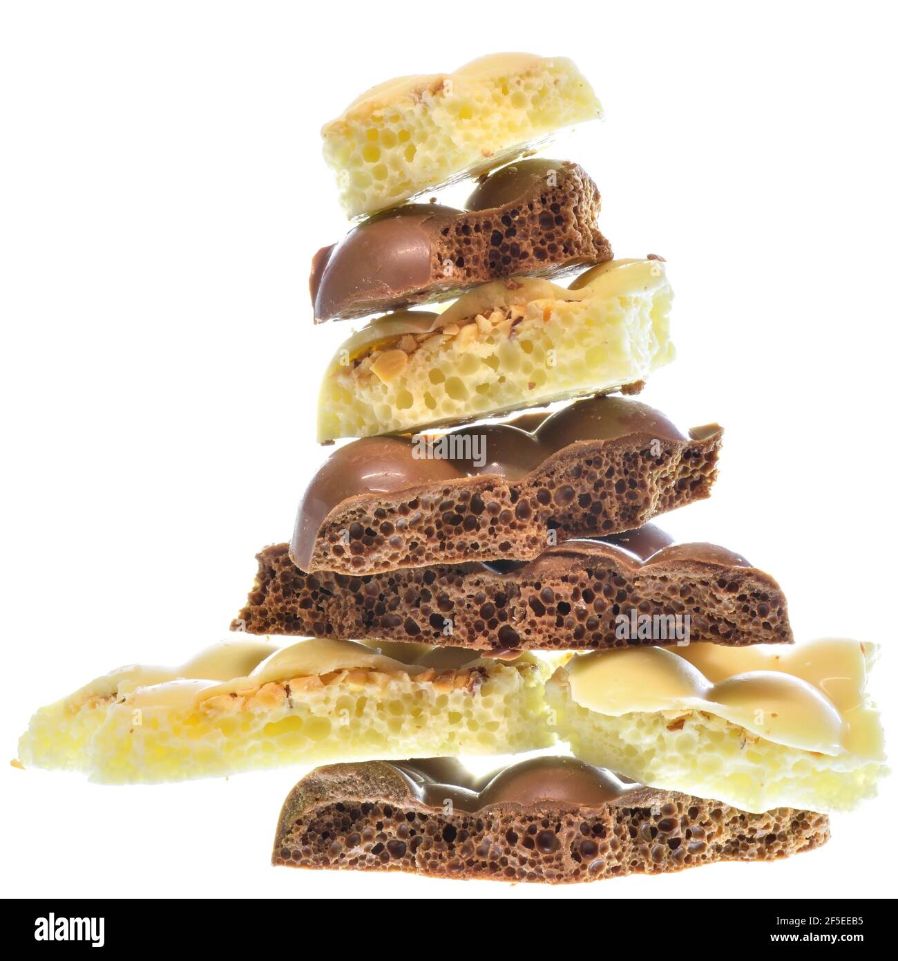 Broken heap porous chocolate Isolated on a white background Stock Photo ...
