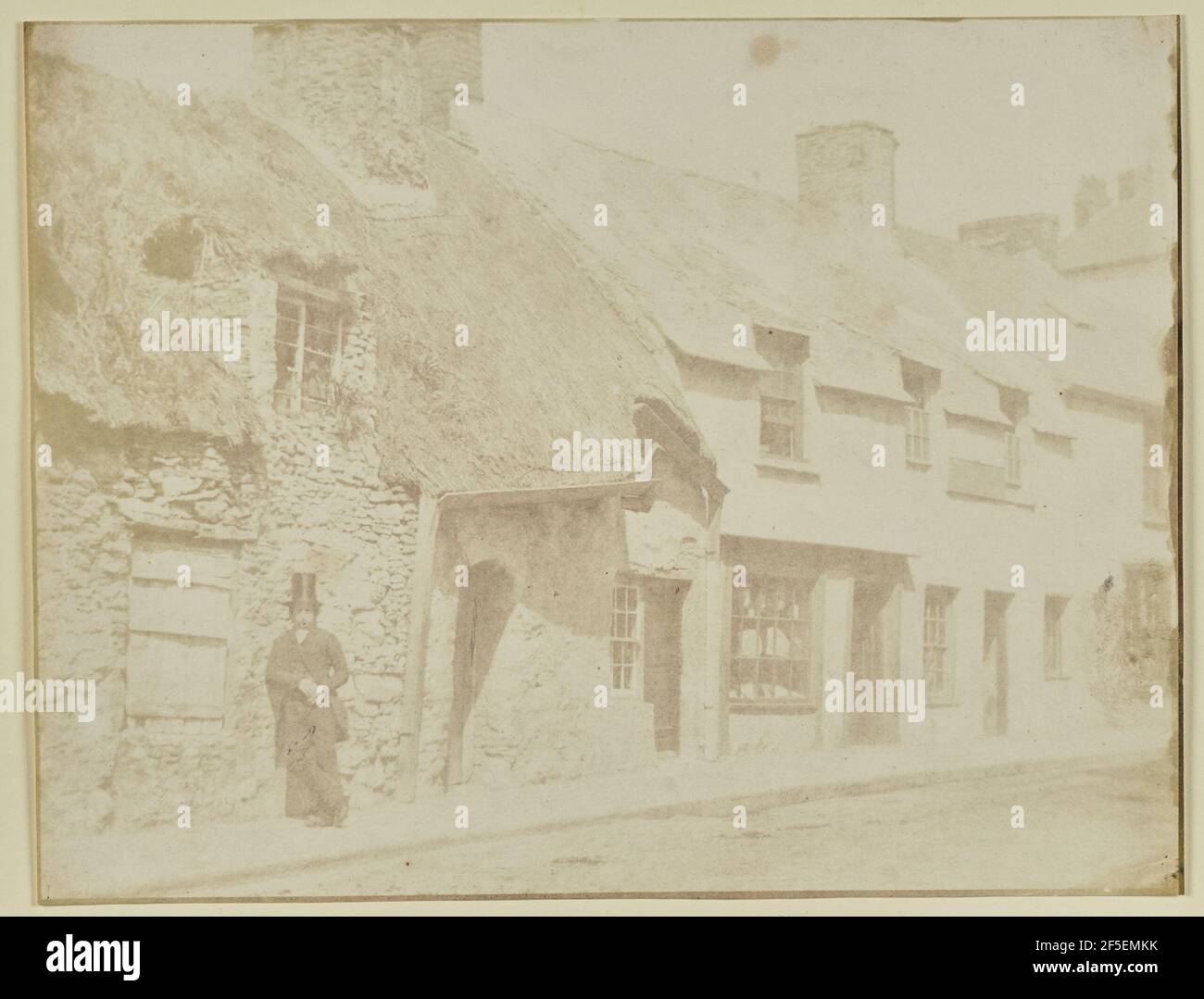 Man standing in front of cottage. Reverend Calvert Jones (British, 1804 ...