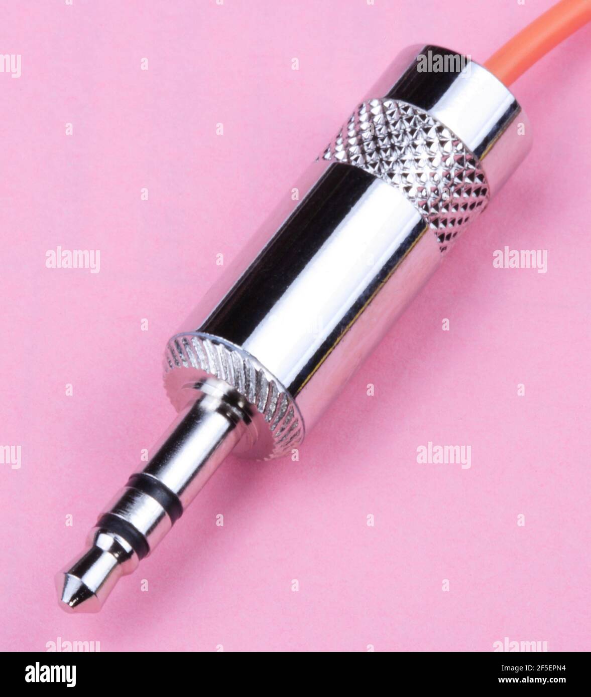 Stereo Male Plug Connector on Pink Background Stock Photo - Alamy