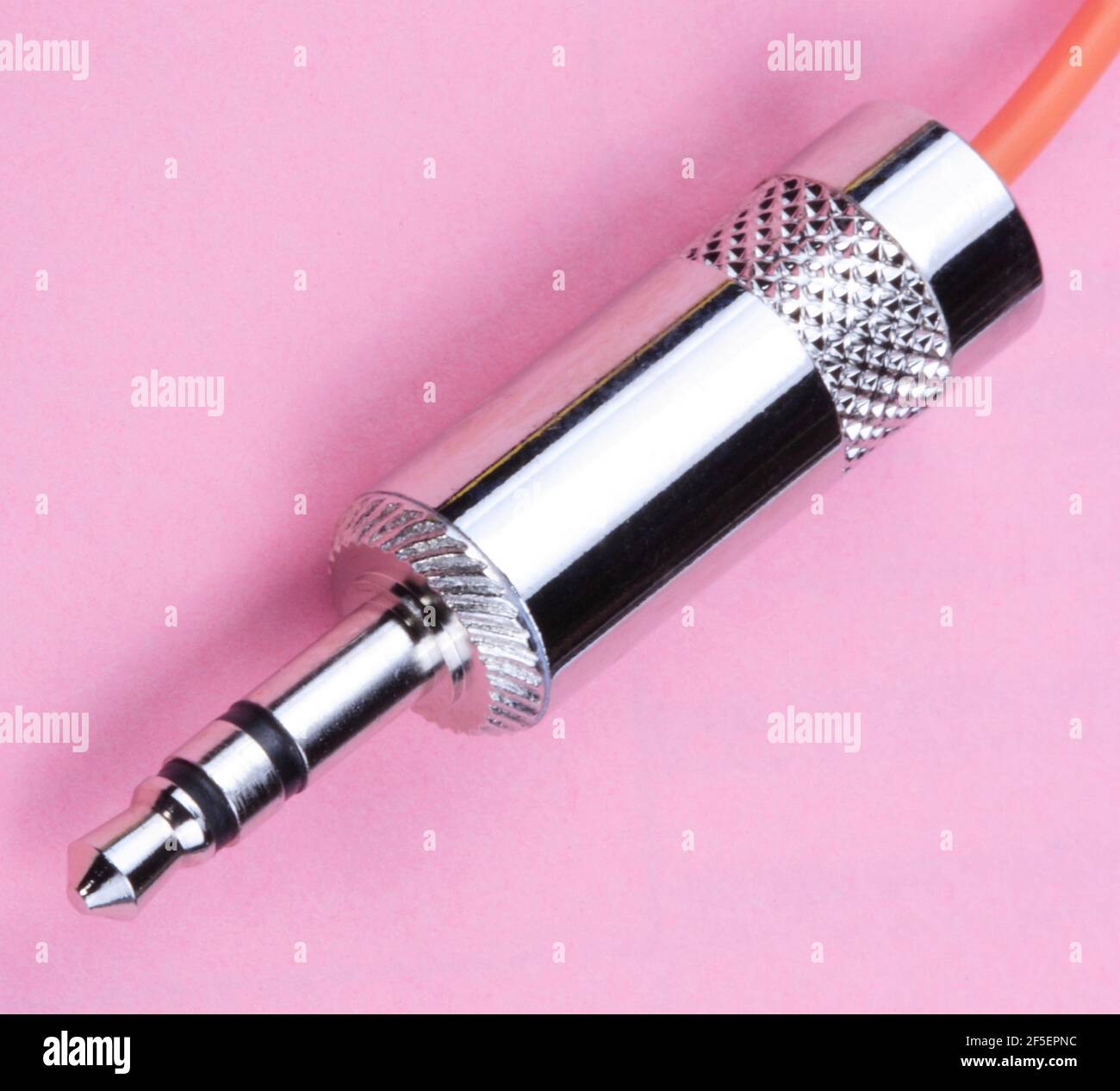 Stereo Male Plug Connector on Pink Background Stock Photo - Alamy