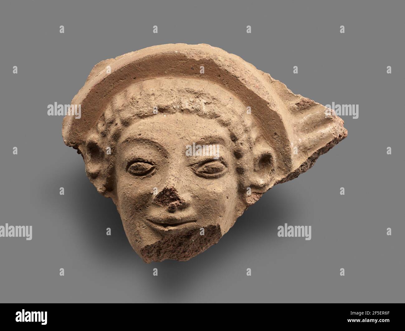 Female Head Antefix. Unknown Stock Photo - Alamy