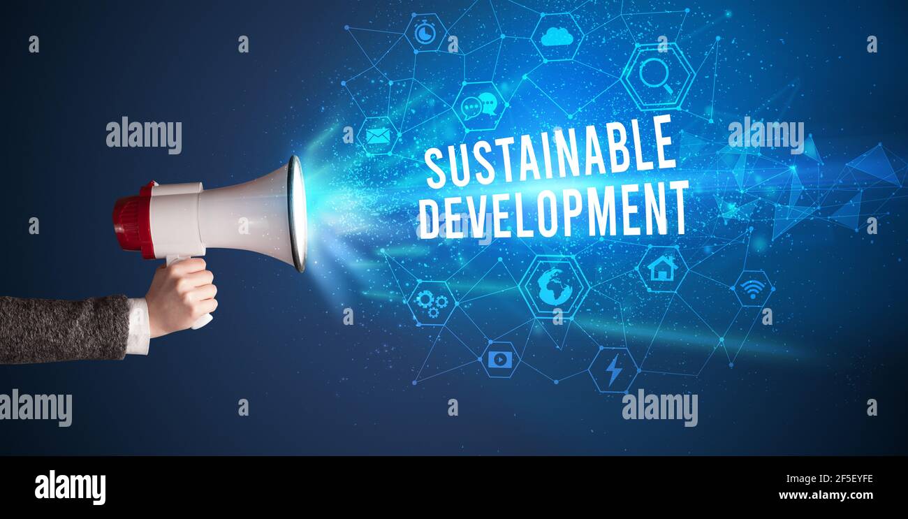 Young woman shouting in megaphone, technology announcement concept ...