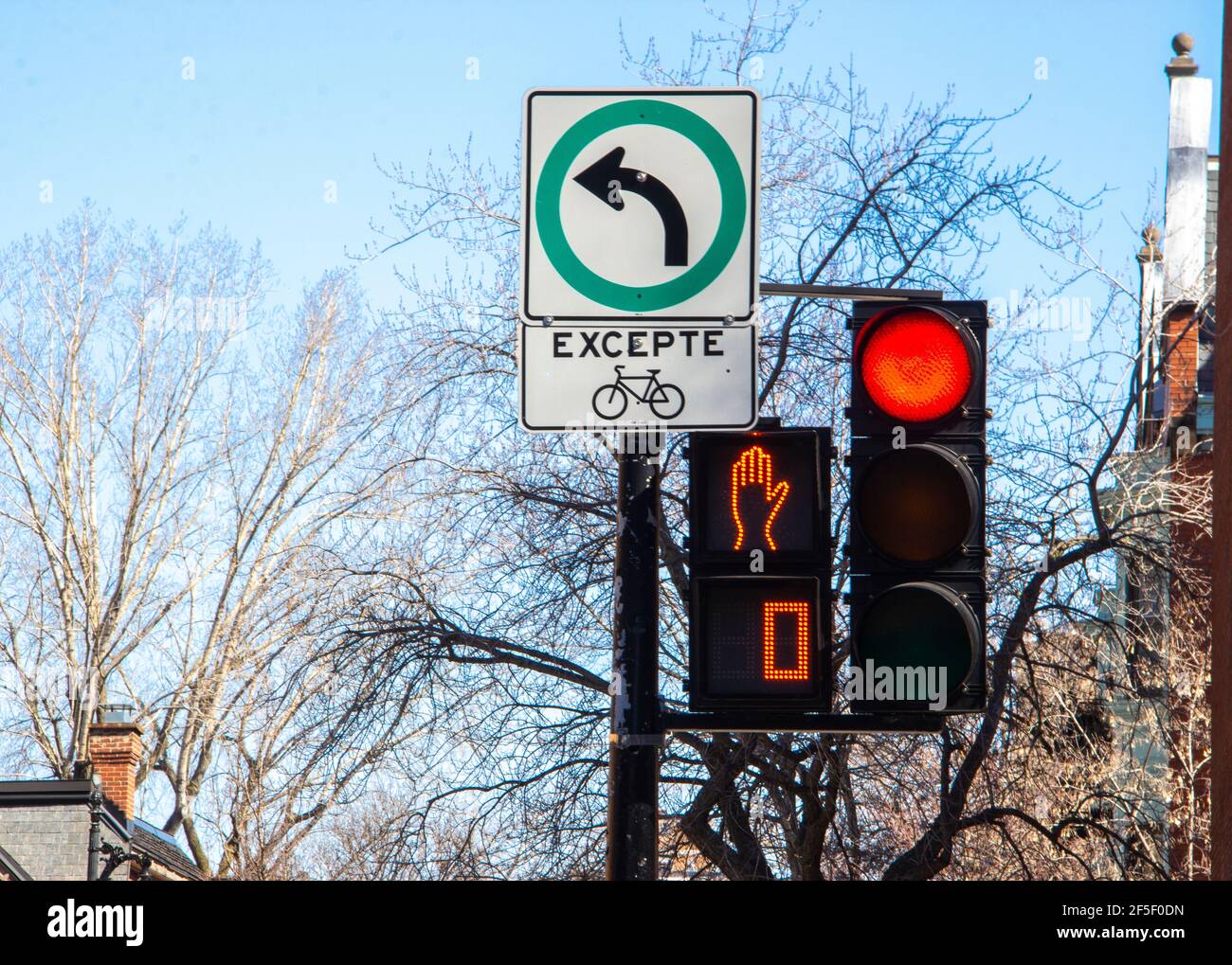 Left turn traffic sign, red light Stock Photo - Alamy