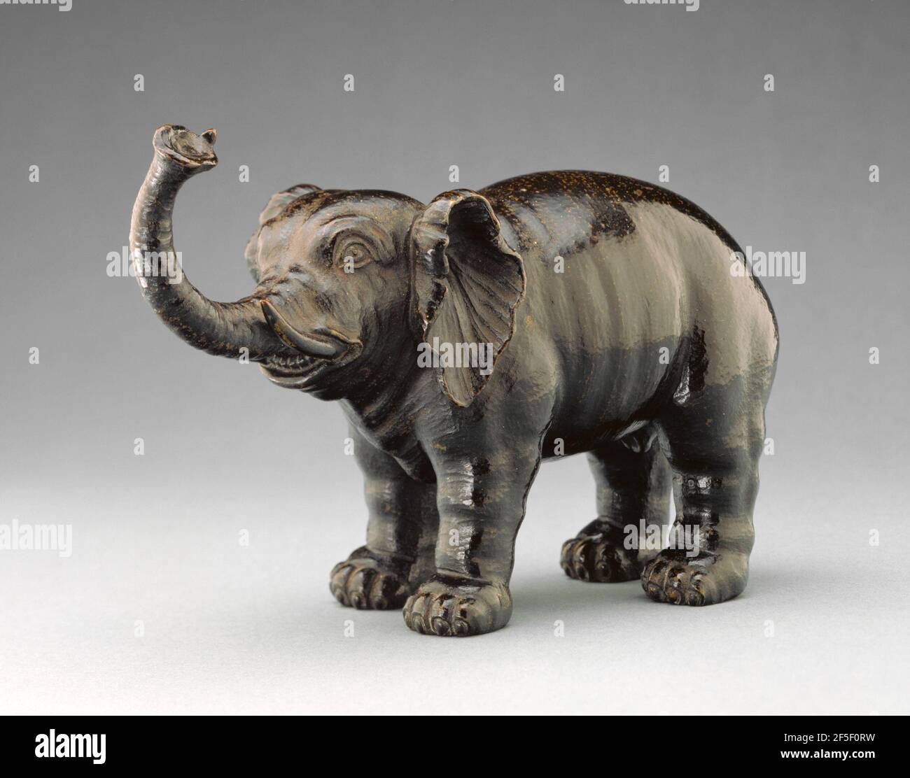 Elephant with Raised Trunk. Unknown Stock Photo - Alamy