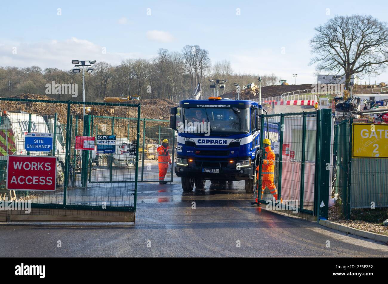 Uxbridge, UK. 19th February, 2021. A Cappagh truck leaves an HS2 ...