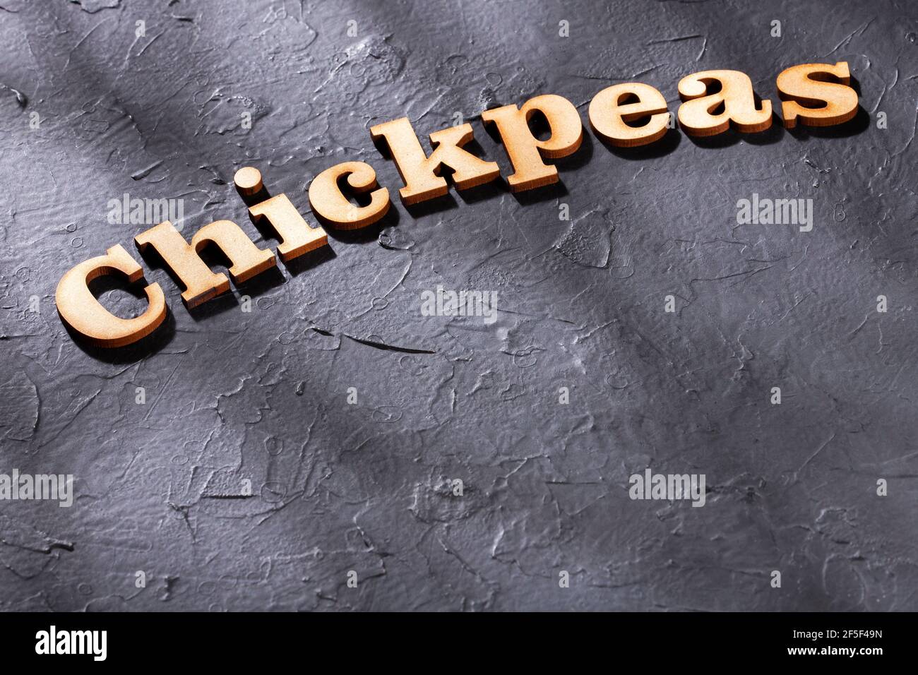 Chickpea phrase in wooden letters - Cicer arietinum Stock Photo - Alamy