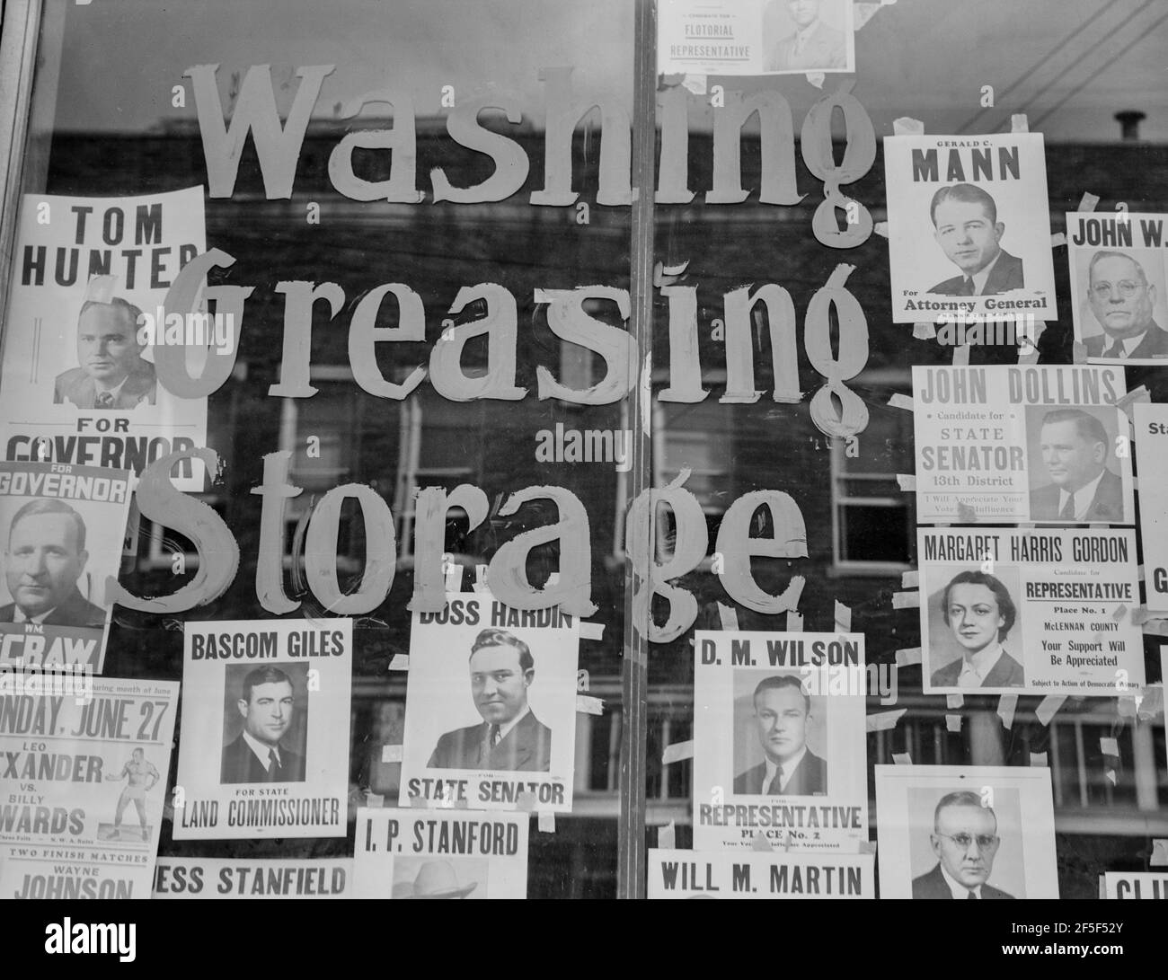 Campaign posters in garage window, just before the primary. Waco, Texas ...