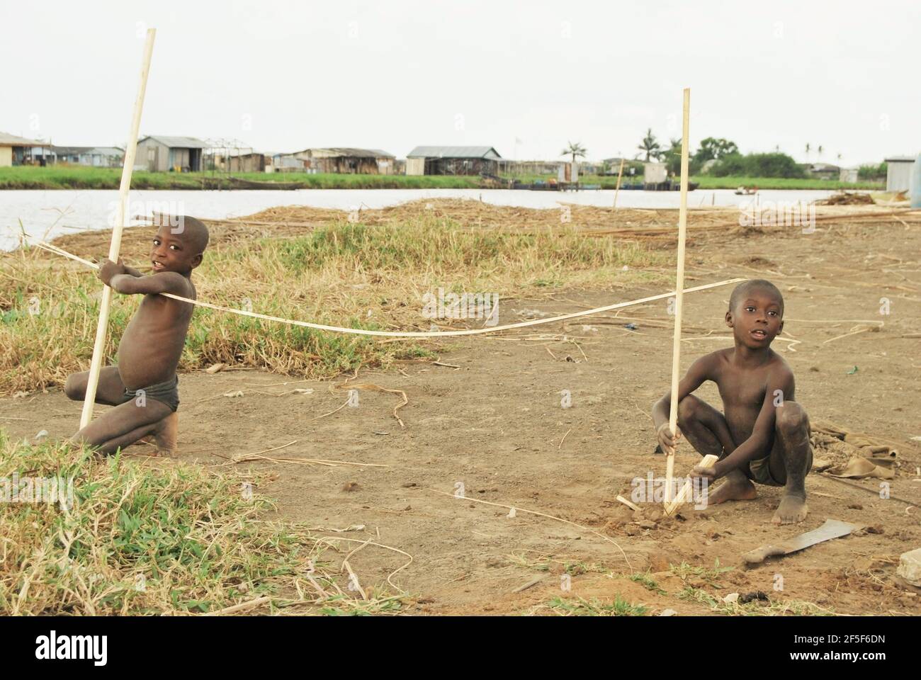 African children playing river hi-res stock photography and images - Alamy