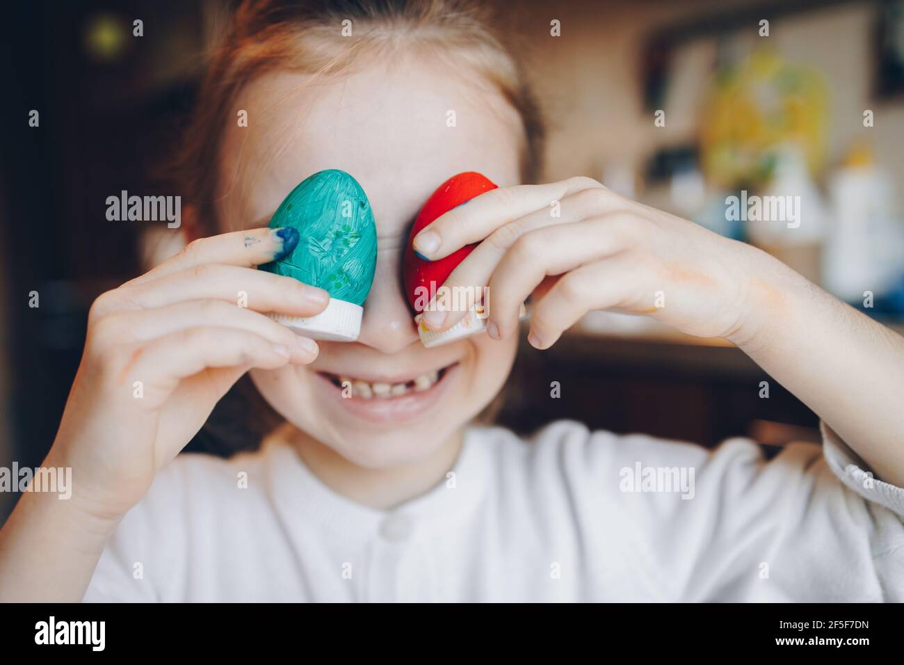 Happy easter. Little girl holding Easter eggs, and preparing for the ...