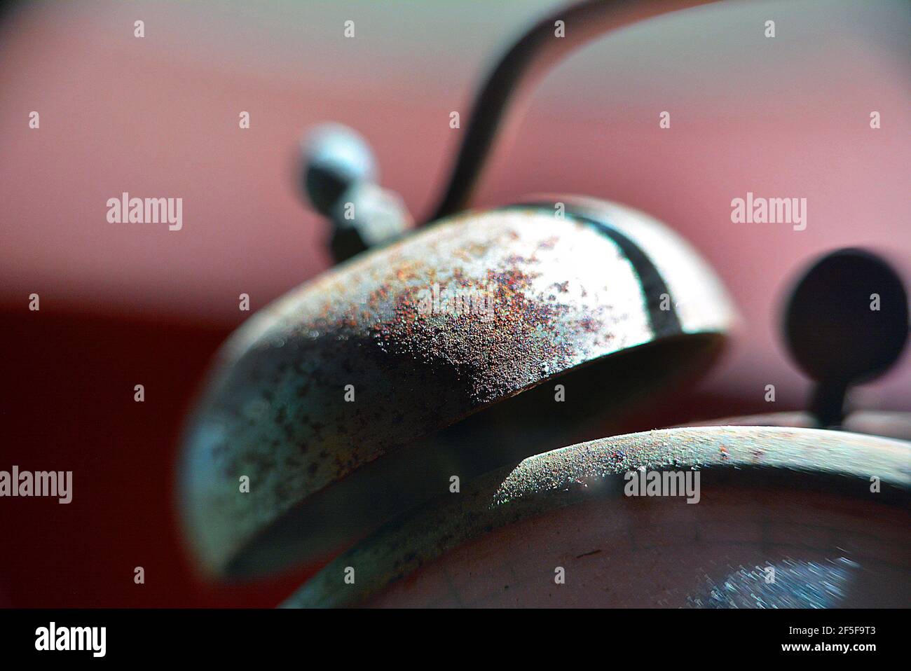 A rusted ringer bell on an antique Gabriel Alarm Clock,made by the ...