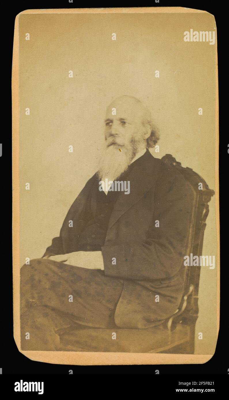Unidentified balding man with a long white beard, seated. William H ...