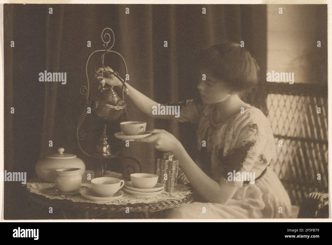 Woman pouring tea. Alice Barber Stephens (American, 1858 - 1932 Stock ...