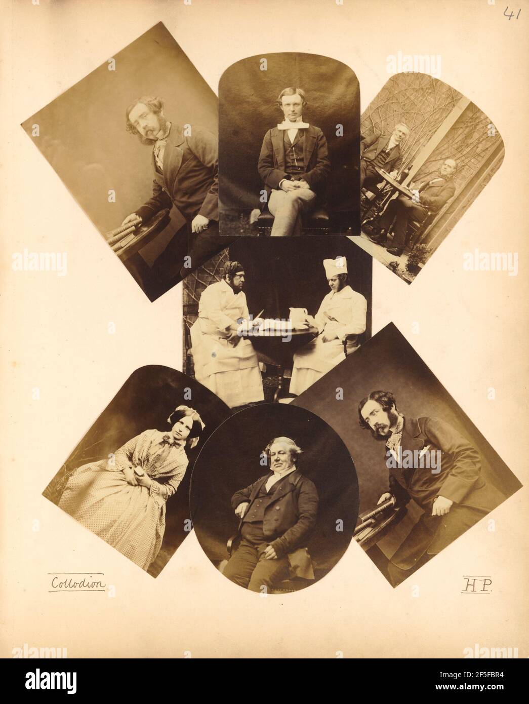 Portrait of two gentlemen drinking outside seating around a table ...