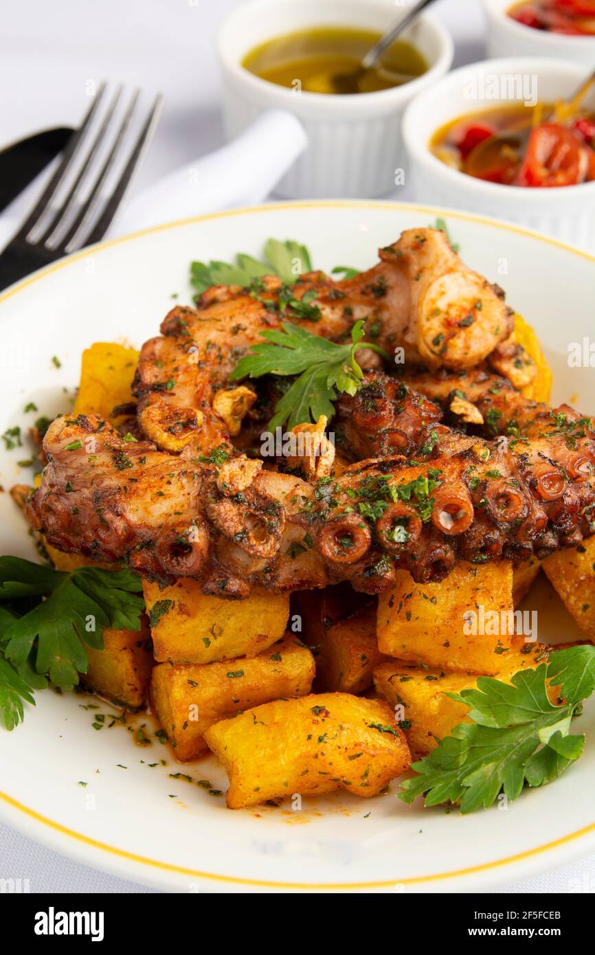 Grilled octopus with potatoes hi-res stock photography and images - Alamy