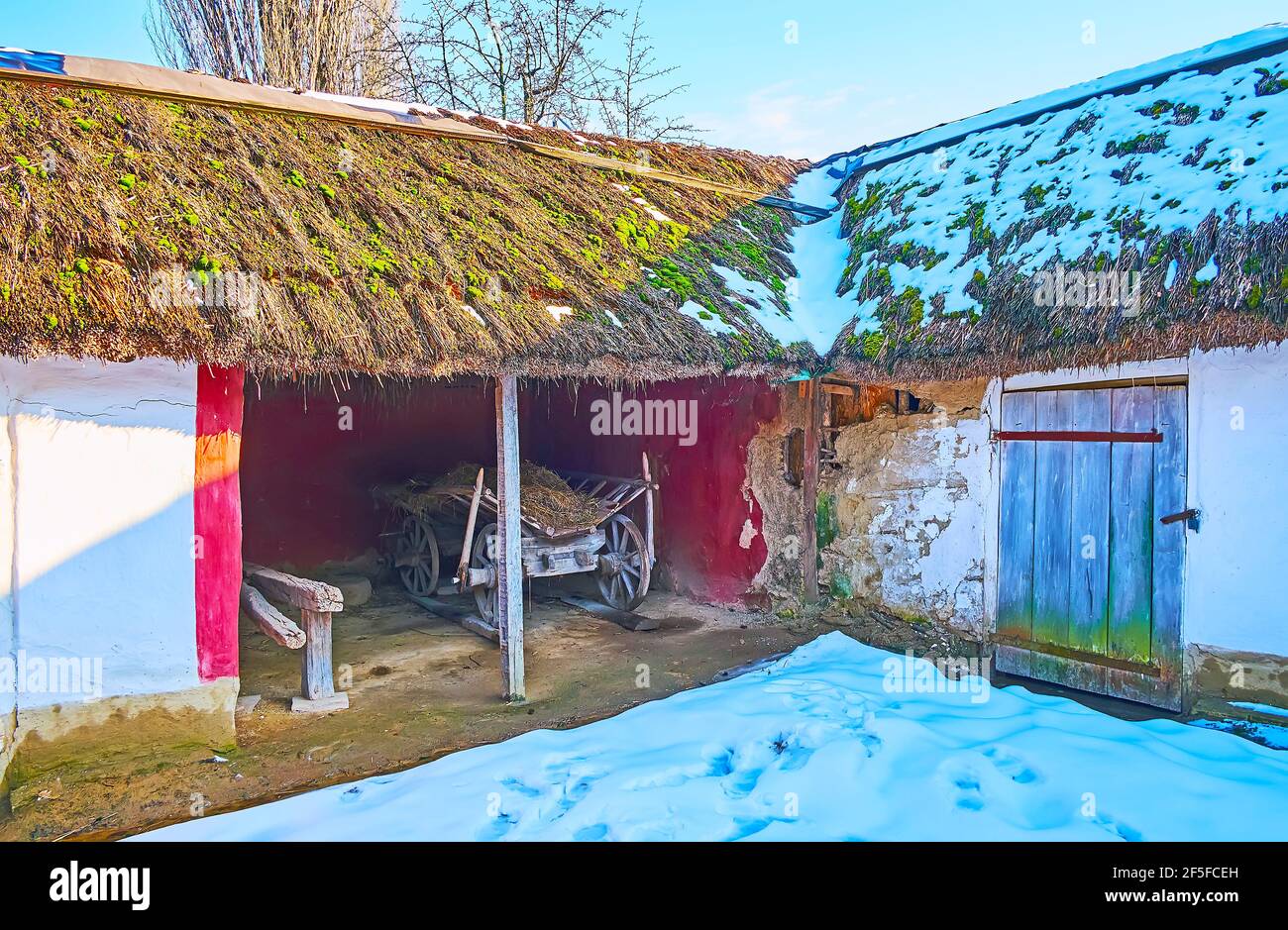 The barn and pen buildings in typical farmstead with a view of the ...