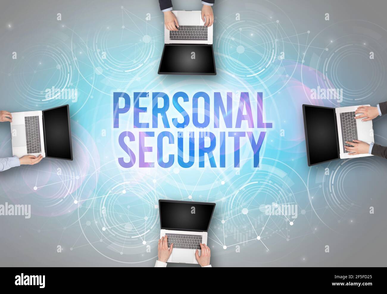 Group of people in front of a laptop, security concept Stock Photo - Alamy