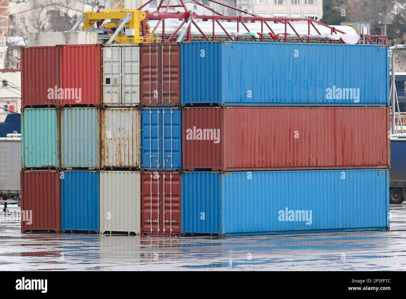 Containers waiting to transfer in a port Stock Photo - Alamy
