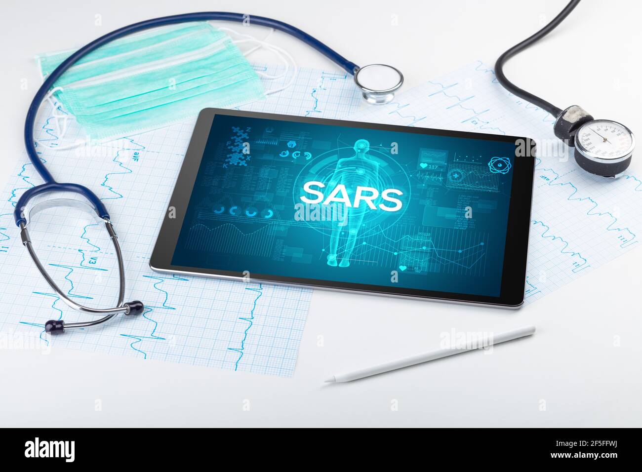 Tablet pc and doctor tools Stock Photo - Alamy